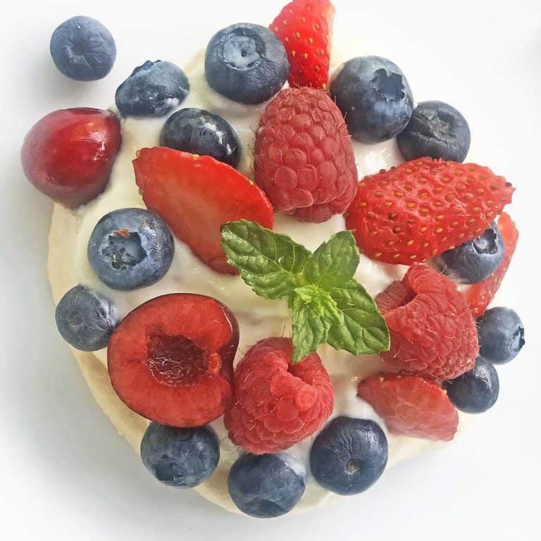 Crispy Meringue Pavlova with Berries - Eliza Cross